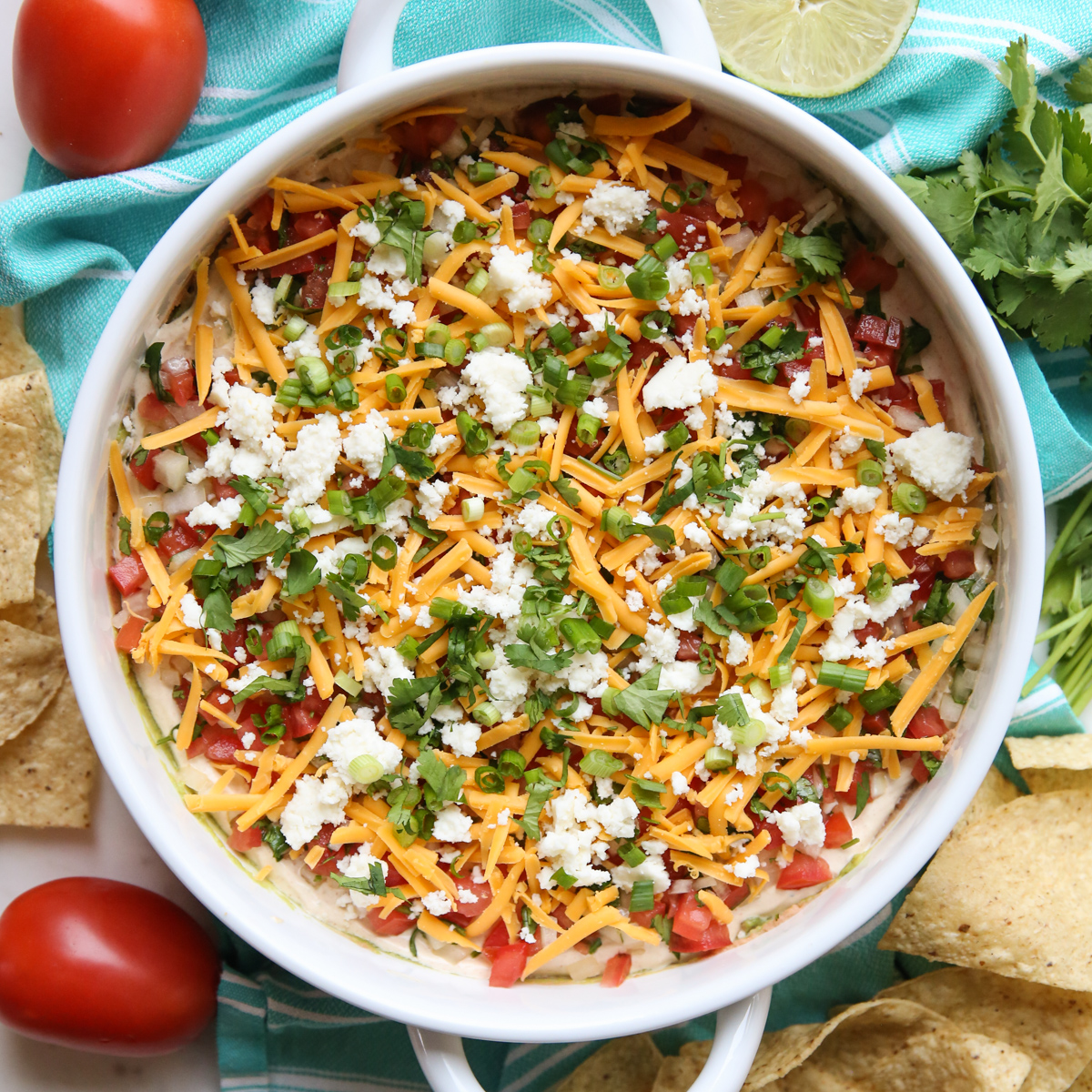 Doctored-Up 7-Layer Dip - Our Best Bites