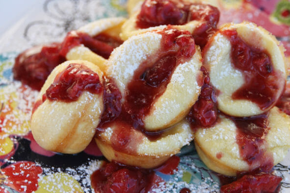Mini Puffed Oven Pancakes with Berry Sauce - Our Best Bites
